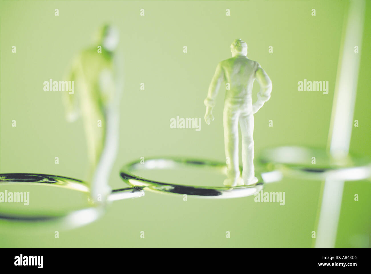 Figures Overcoming Obstacles Stock Photo - Alamy