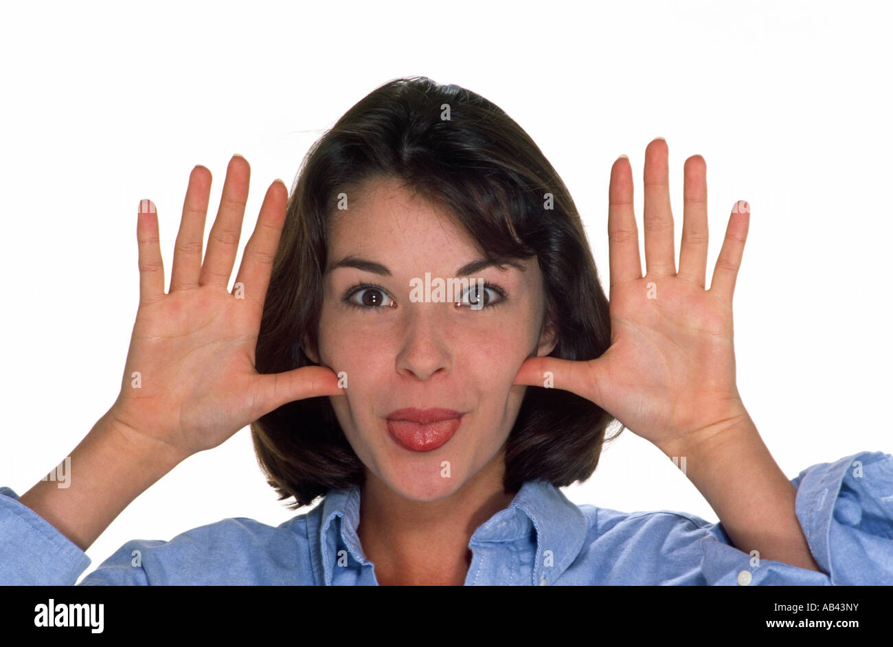 Woman making funny faces Stock Photo - Alamy