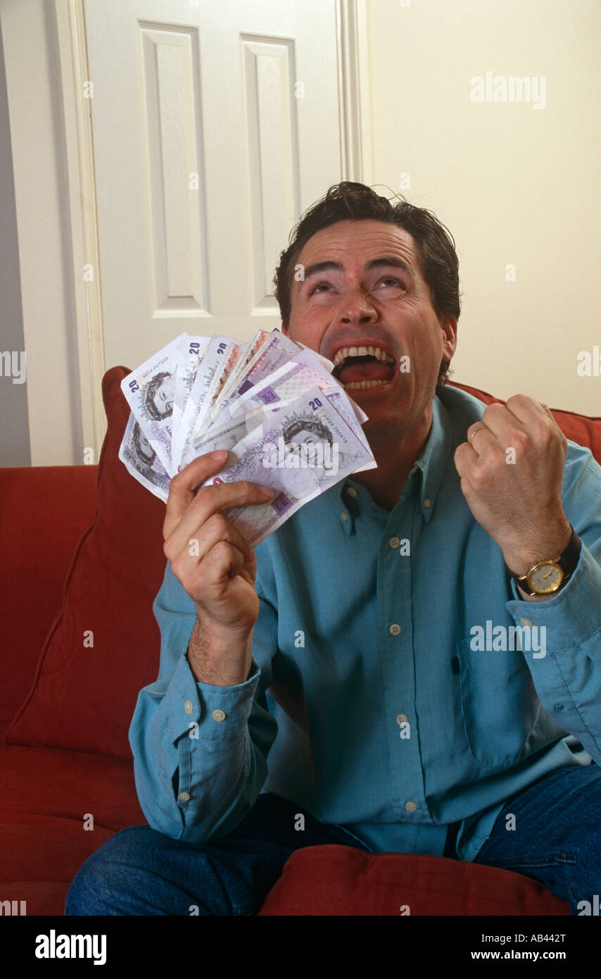 Happy money hi-res stock photography and images - Alamy