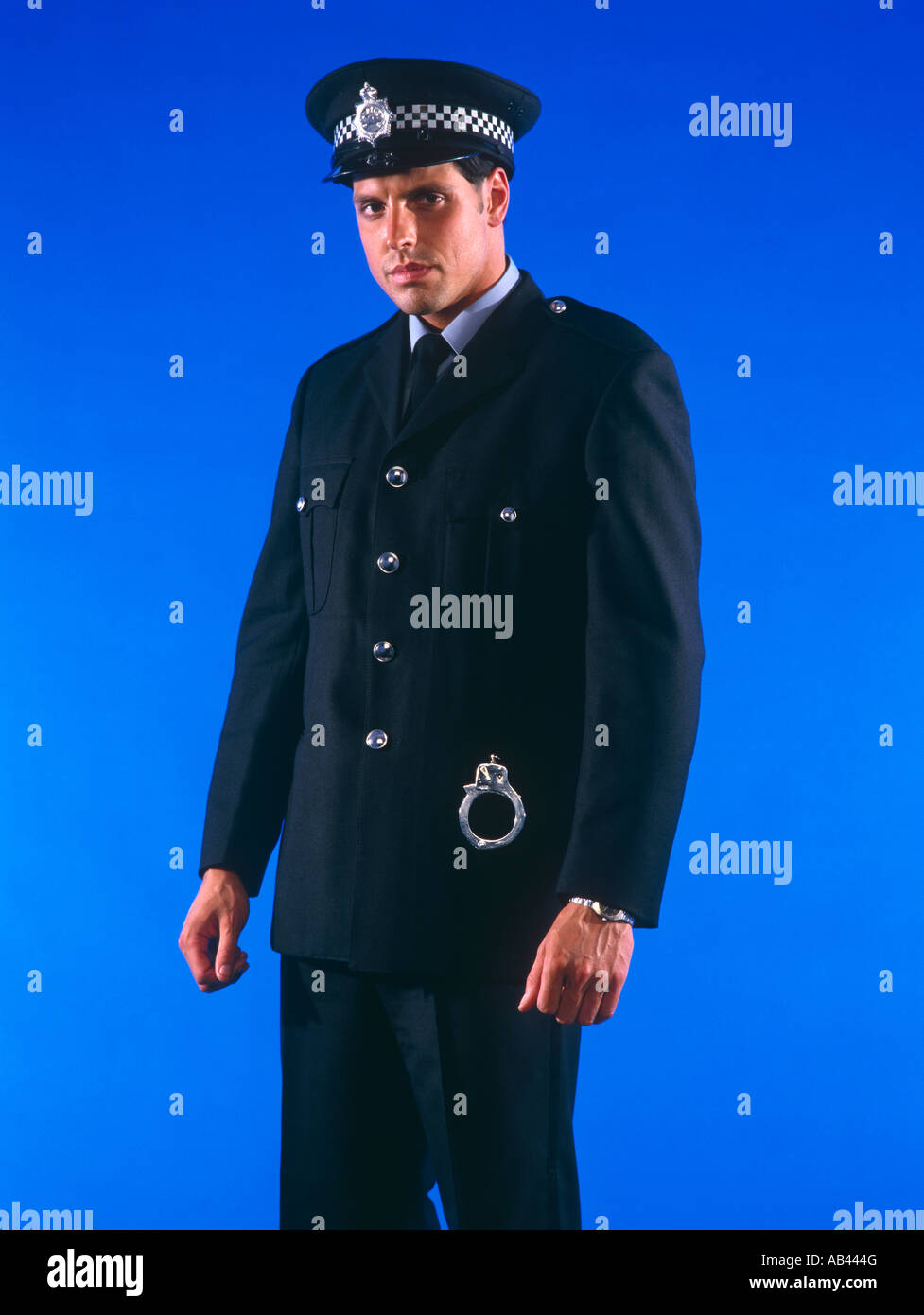 Man in police uniform Stock Photo - Alamy