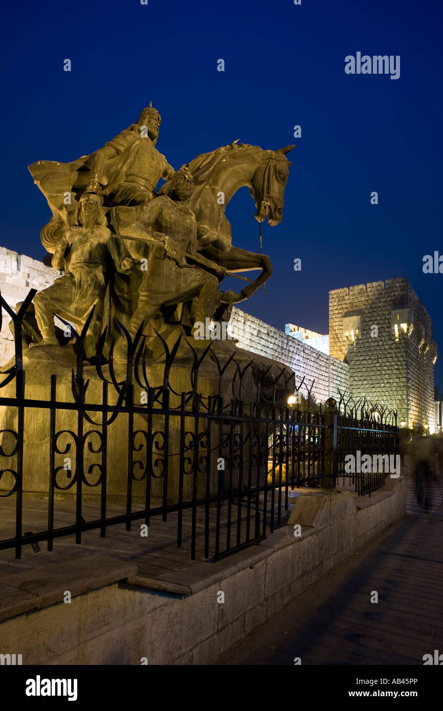 A statue of Saladin stands in front of the citadel Damascus Stock Photo ...
