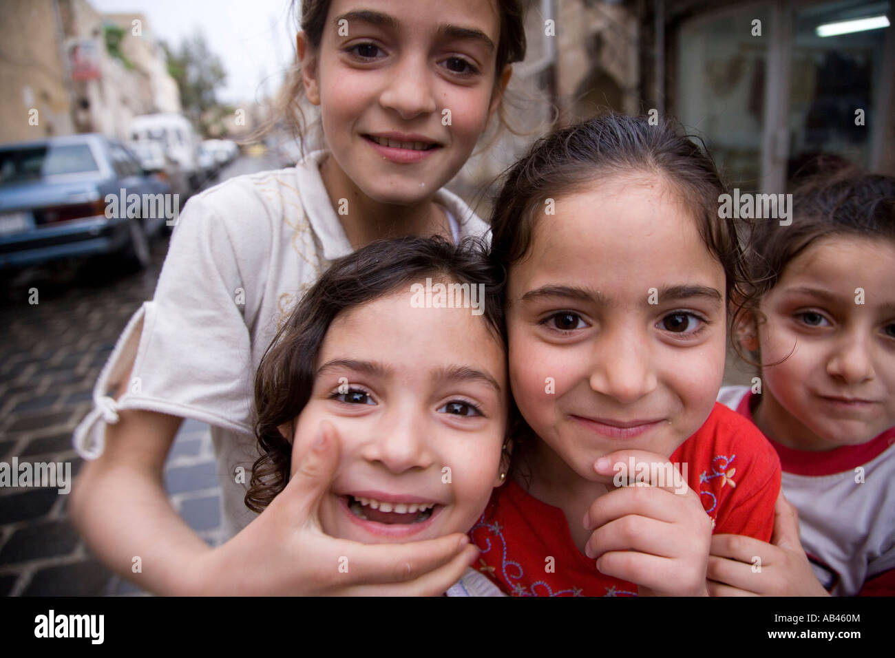 Children playing after a storm in the Old City Aleppo Stock Photo - Alamy