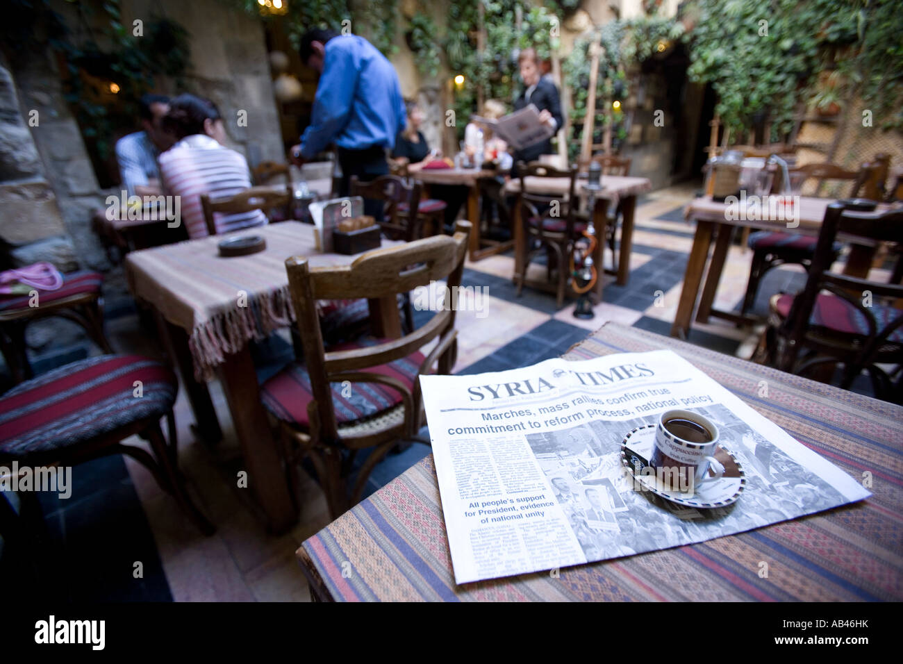 Drinking coffee in the laid back Cafe Anbar in Old Damascus Stock Photo ...