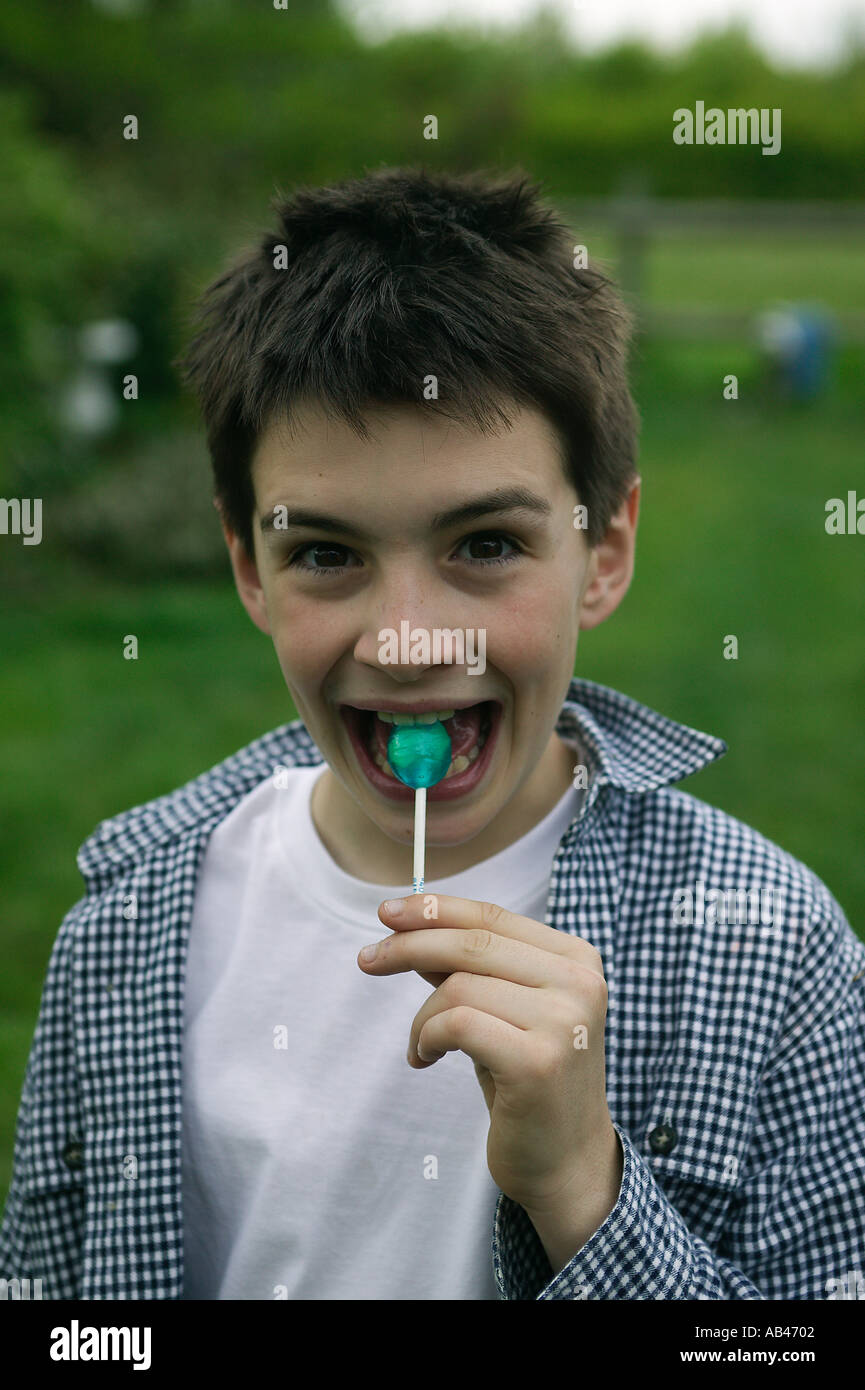 young boy with lolipop england uk Stock Photo - Alamy
