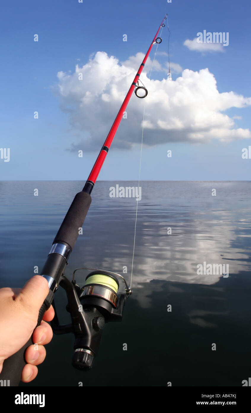 fishing in a lake Stock Photo - Alamy