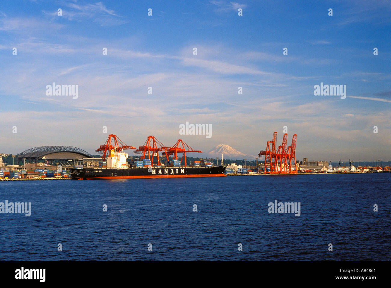 Container Ship being loaded at Port of Seattle with Mount Rainier and ...