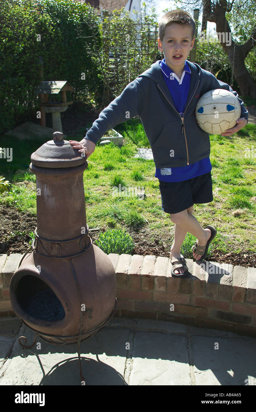 Young boy football ball poses hi-res stock photography and images - Alamy