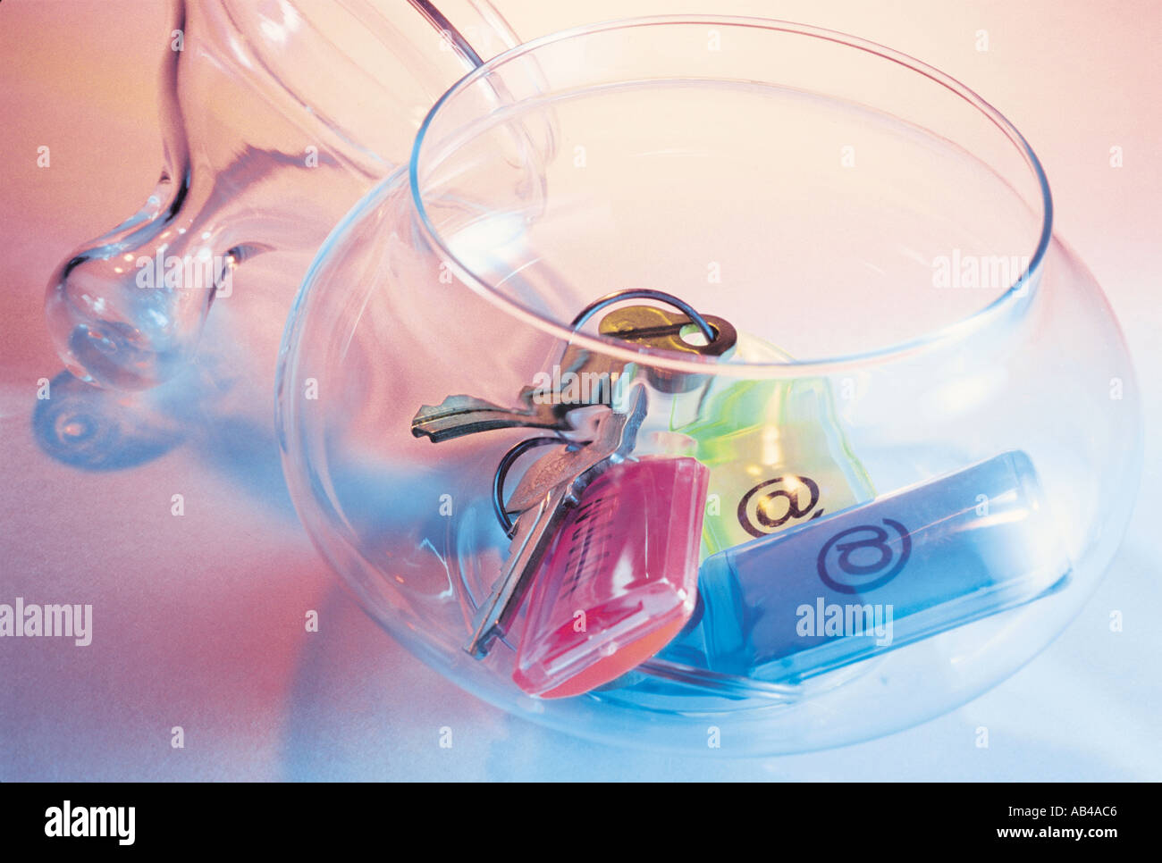 Key Tags in Glass Jar Stock Photo - Alamy