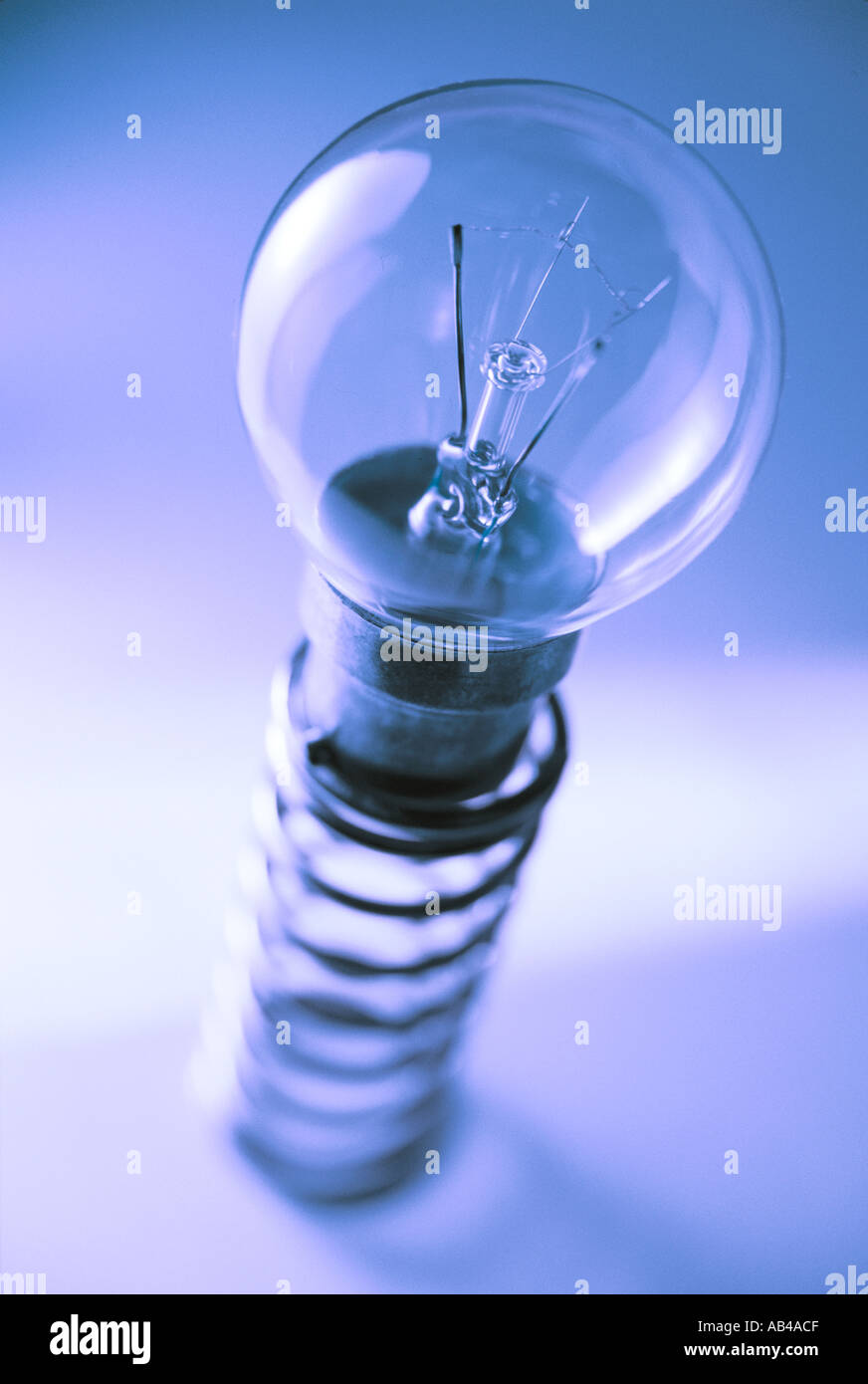 Light Bulb on Coil Stock Photo - Alamy