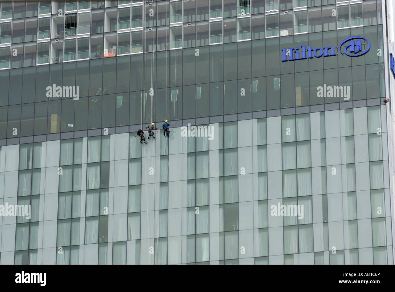 Three workers carrying out an abseil inspection the Beetham Tower, the ...