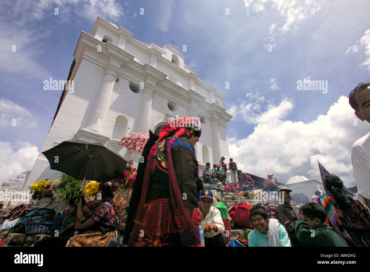 Local people in traditional dress on the venerated steps of Santo Tomas ...