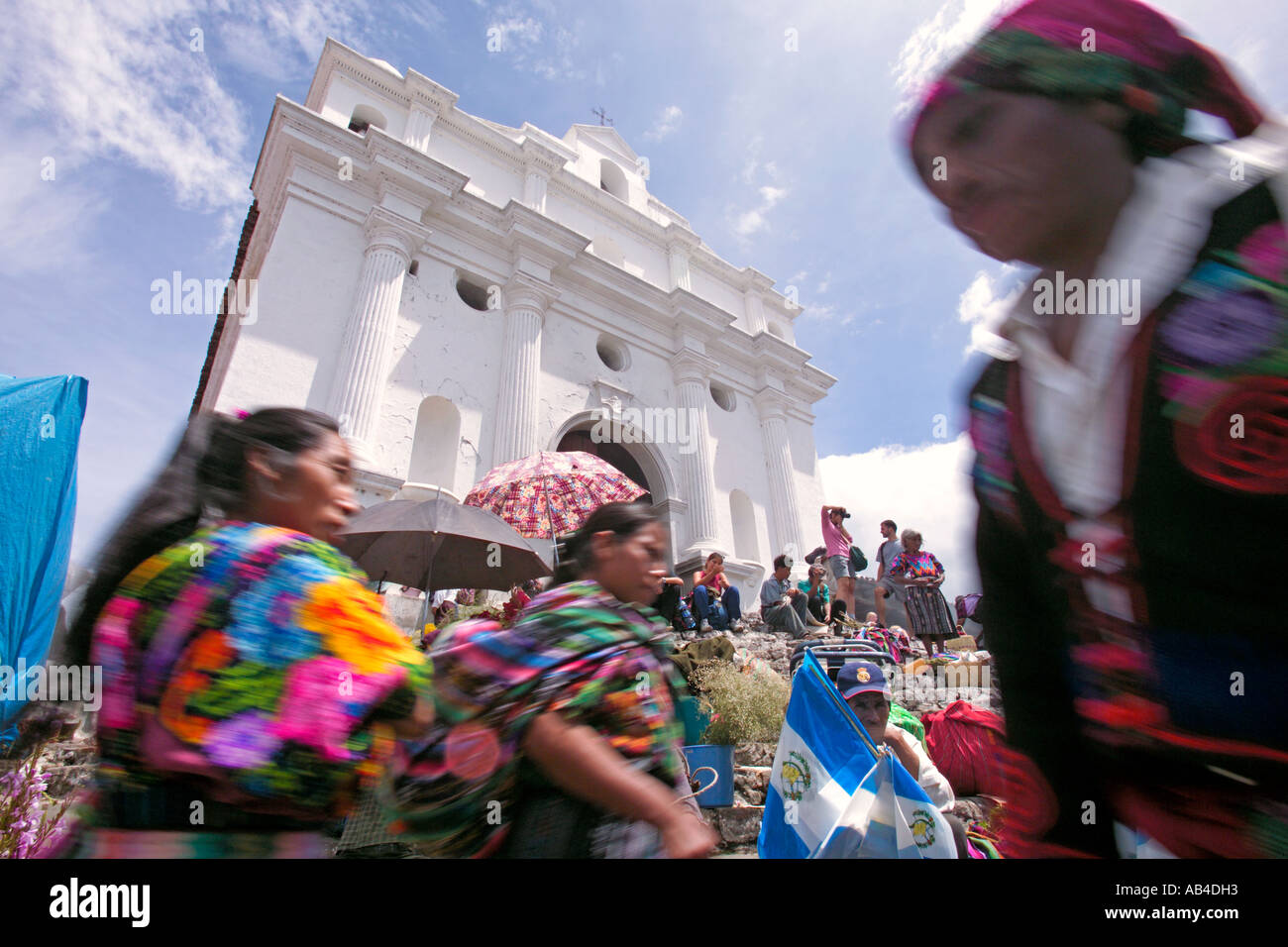 Local people in traditional dress on the venerated steps of Santo Tomas ...
