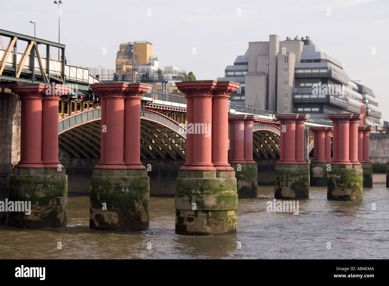 Empty bridge piers between two bridges over the river Thames in London ...