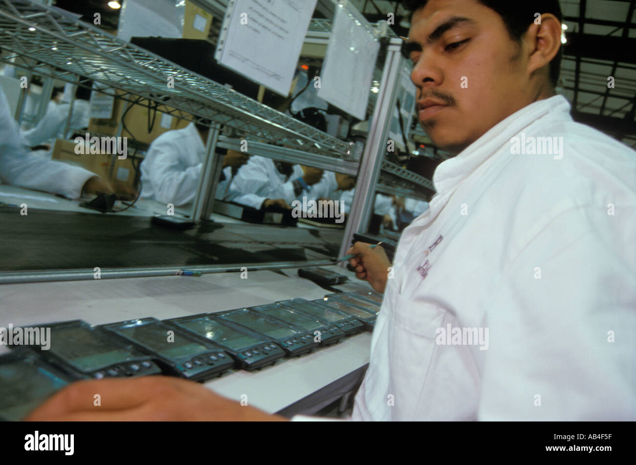 Quality control check on the Palm Pilot assembly line at the ...