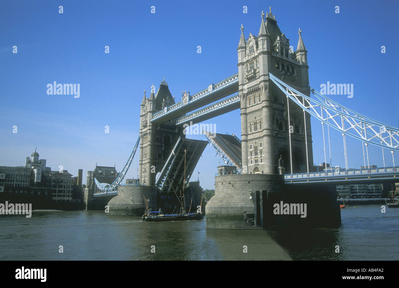 Tower Bridge London opens old ship vessel tall mast sail St Katherine s ...