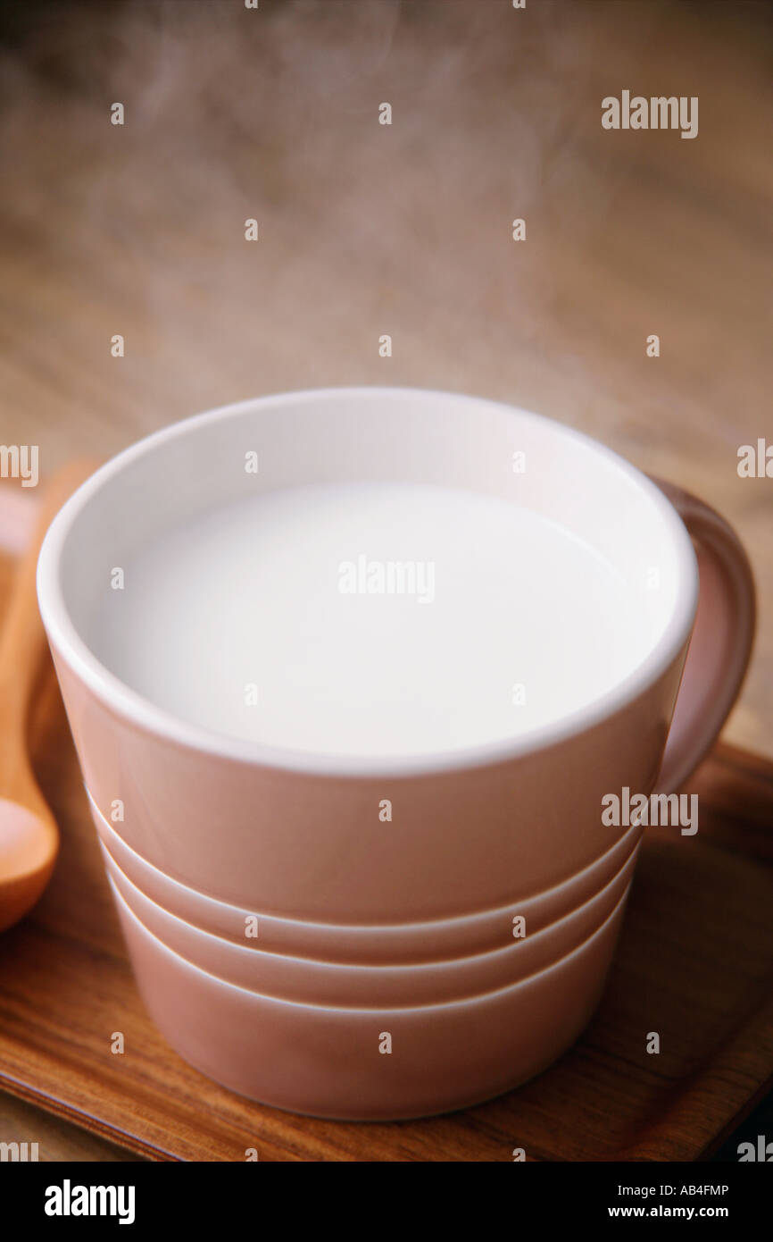 A cup of hot milk Stock Photo - Alamy