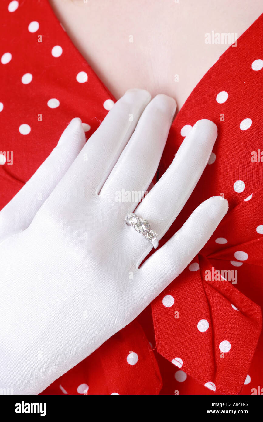 Woman wearing diamond rings hi-res stock photography and images - Alamy