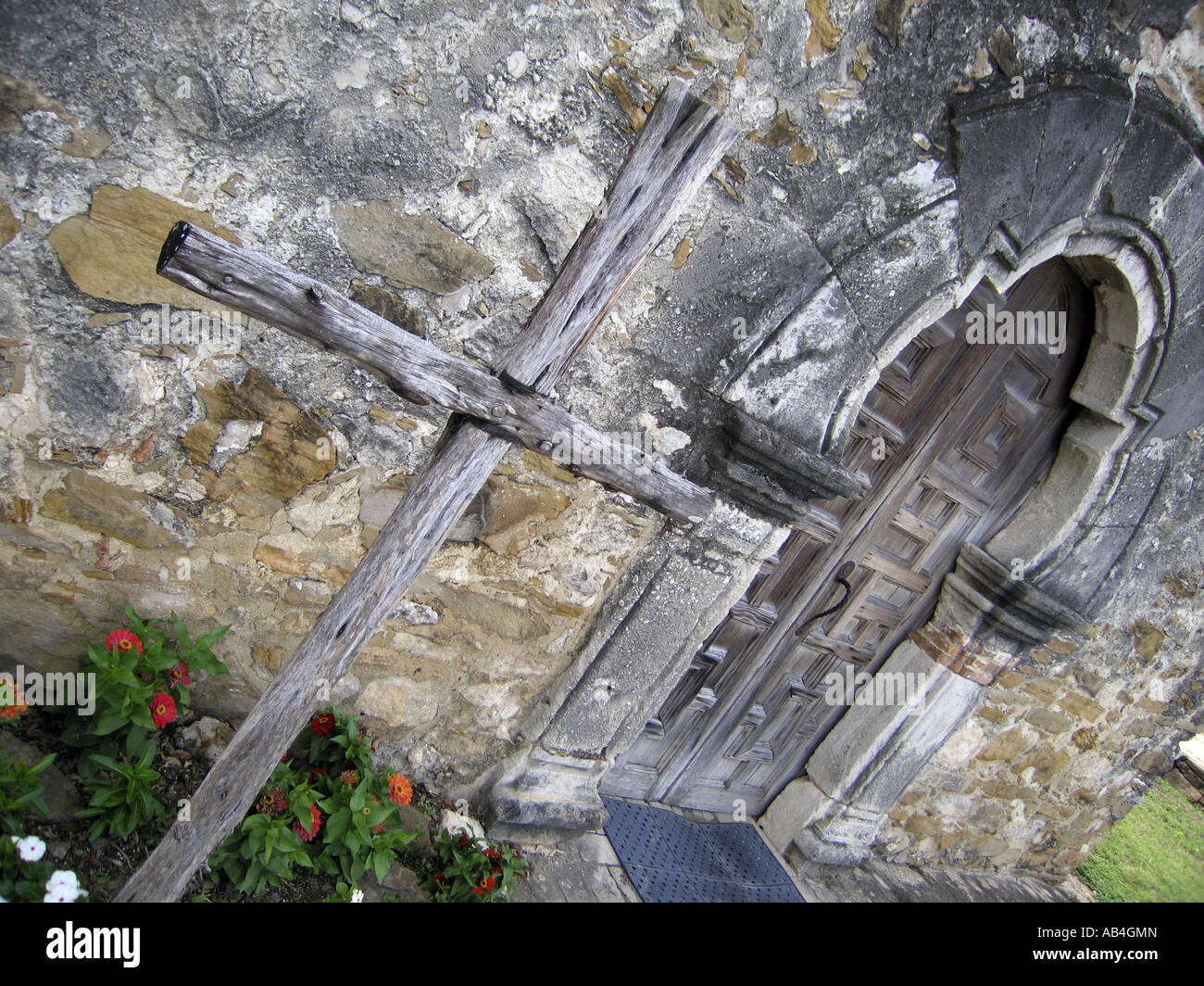 A cross in front of a doorway Stock Photo - Alamy