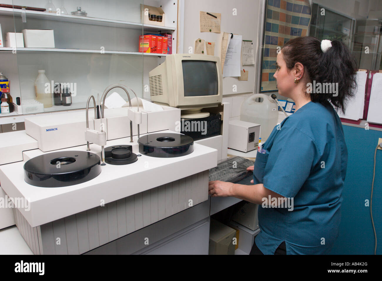 Using lab centrifuge in chemical hi-res stock photography and images ...