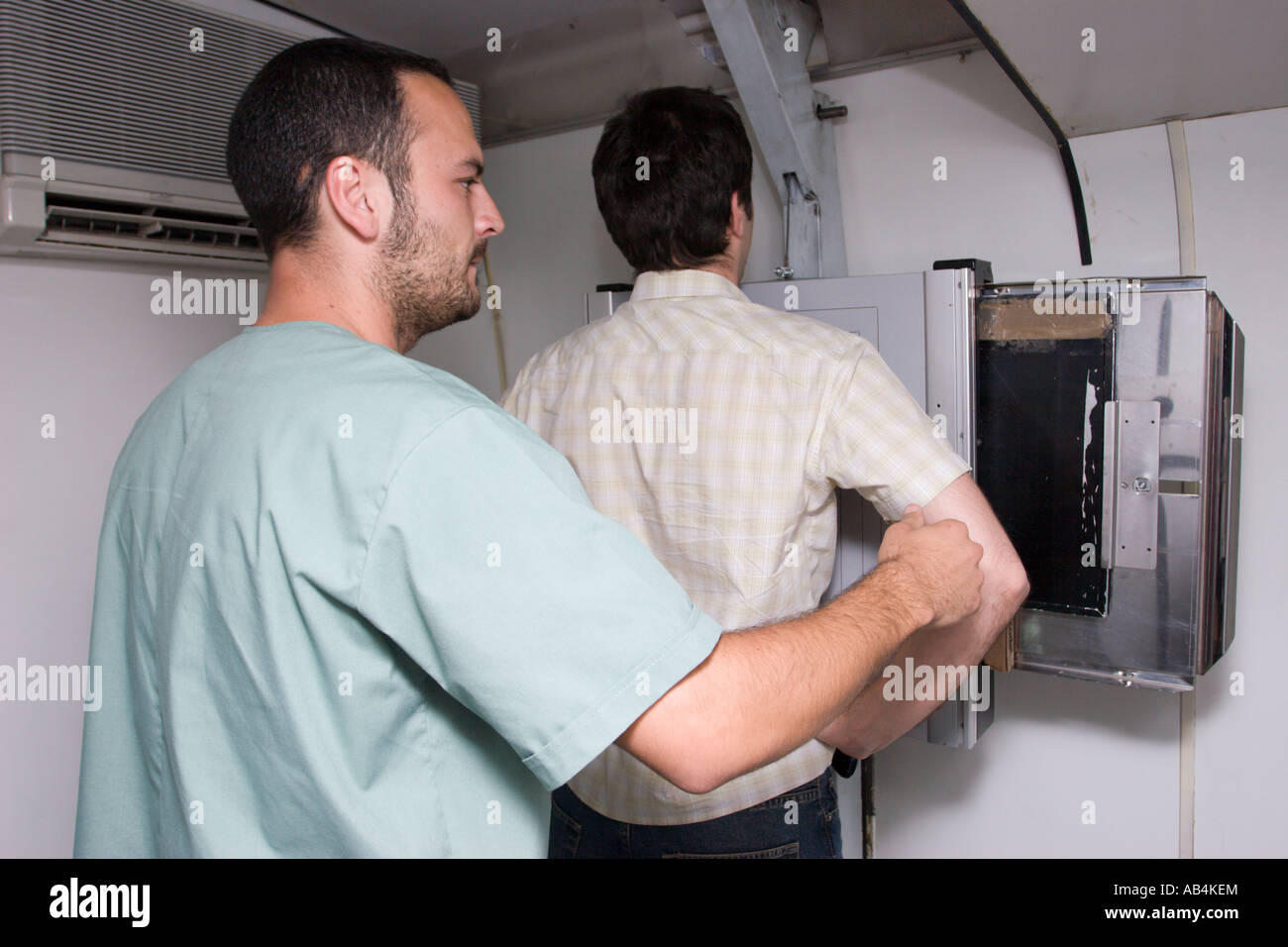 Radiographer about to xray a patient in a mobile health unit Stock ...