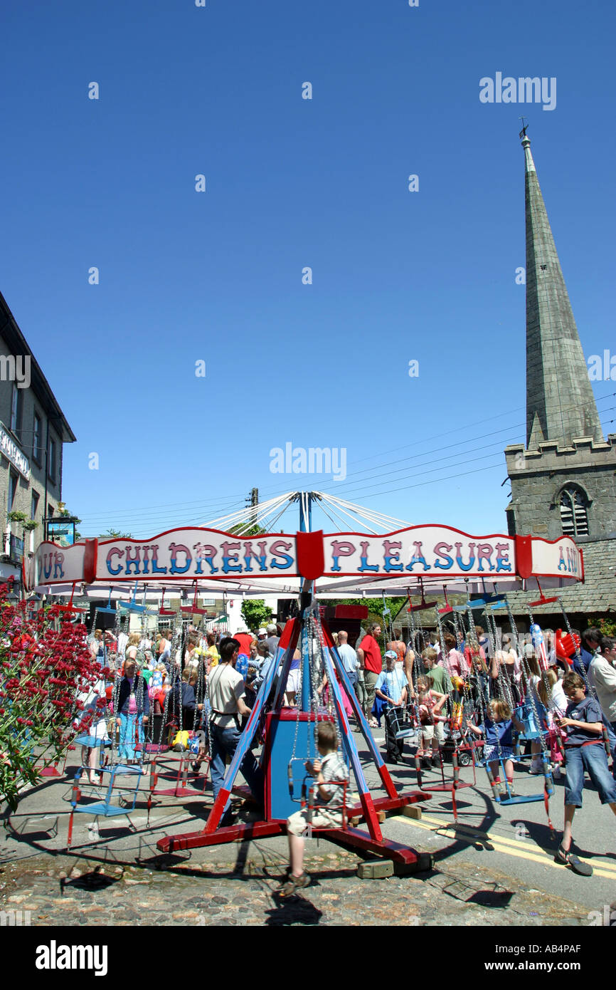 Children on a roundabout at a fun fair hi-res stock photography and ...