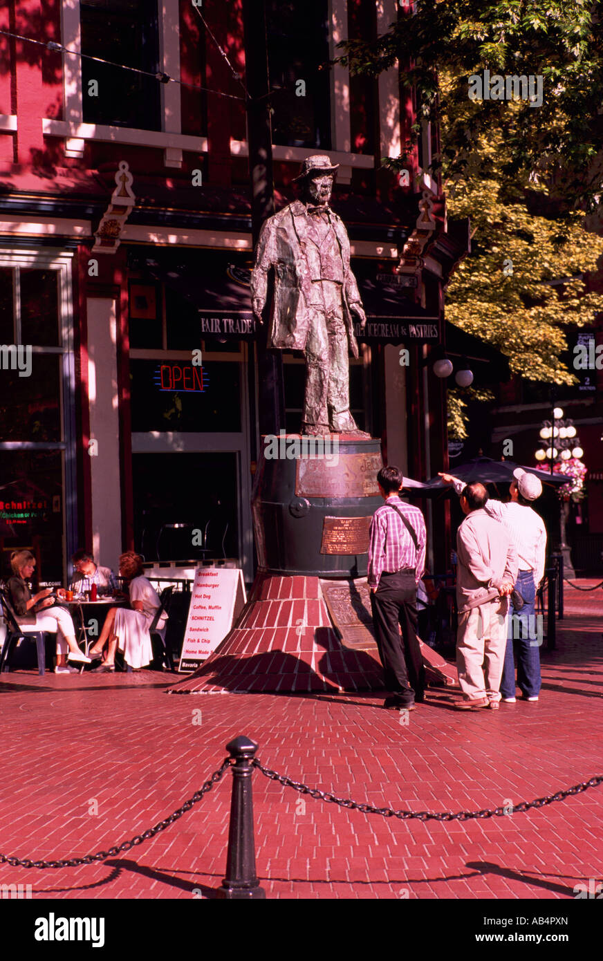 Tourists at the "Gassy Jack" Statue at "Maple Tree Square" in Historic ...