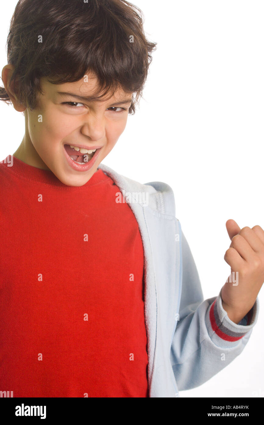 Young boy in a celebrating pose like he was saying YES Studio shot ...