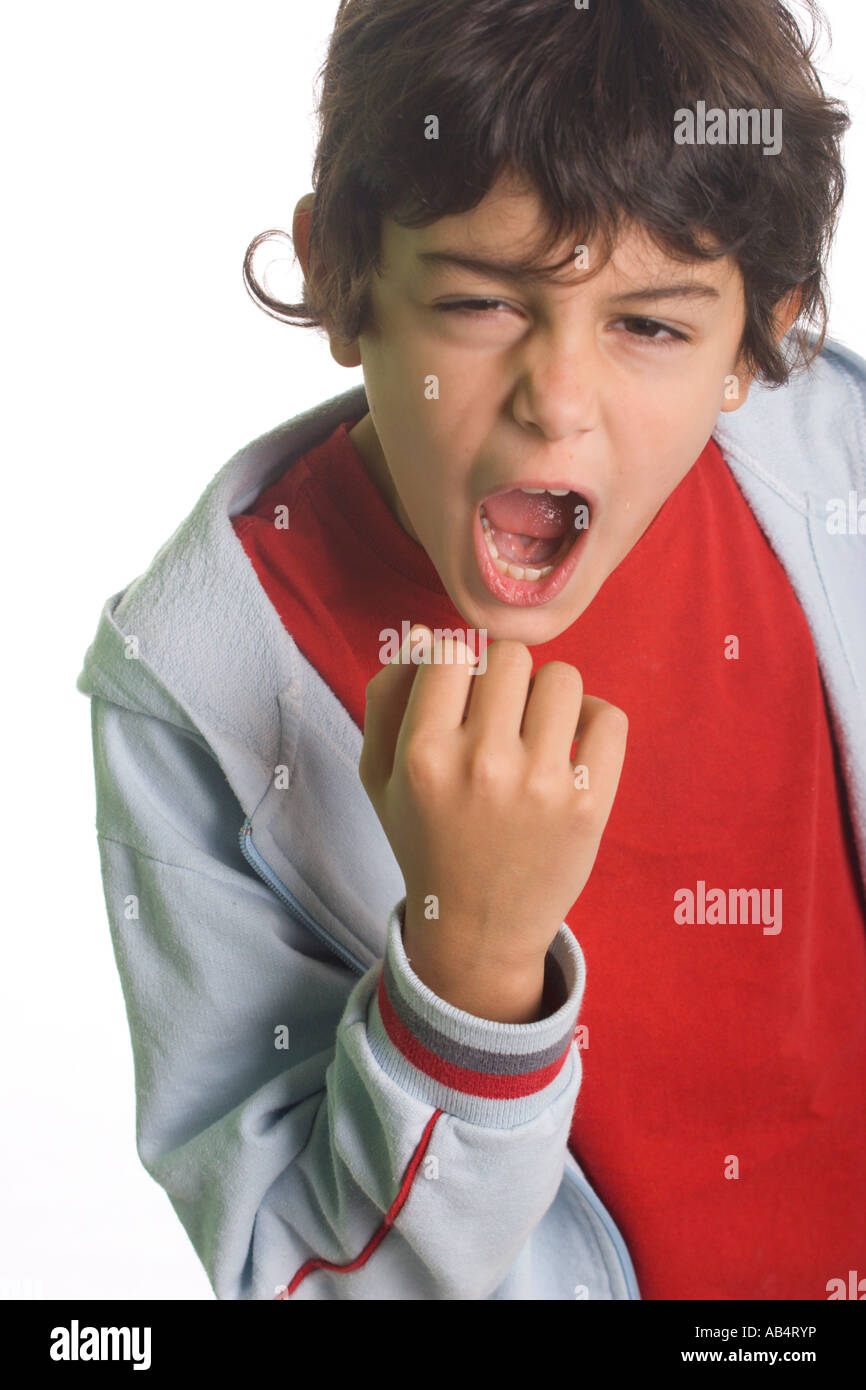 Young boy celebrating or yelling a goal Studio shot isolated on white ...