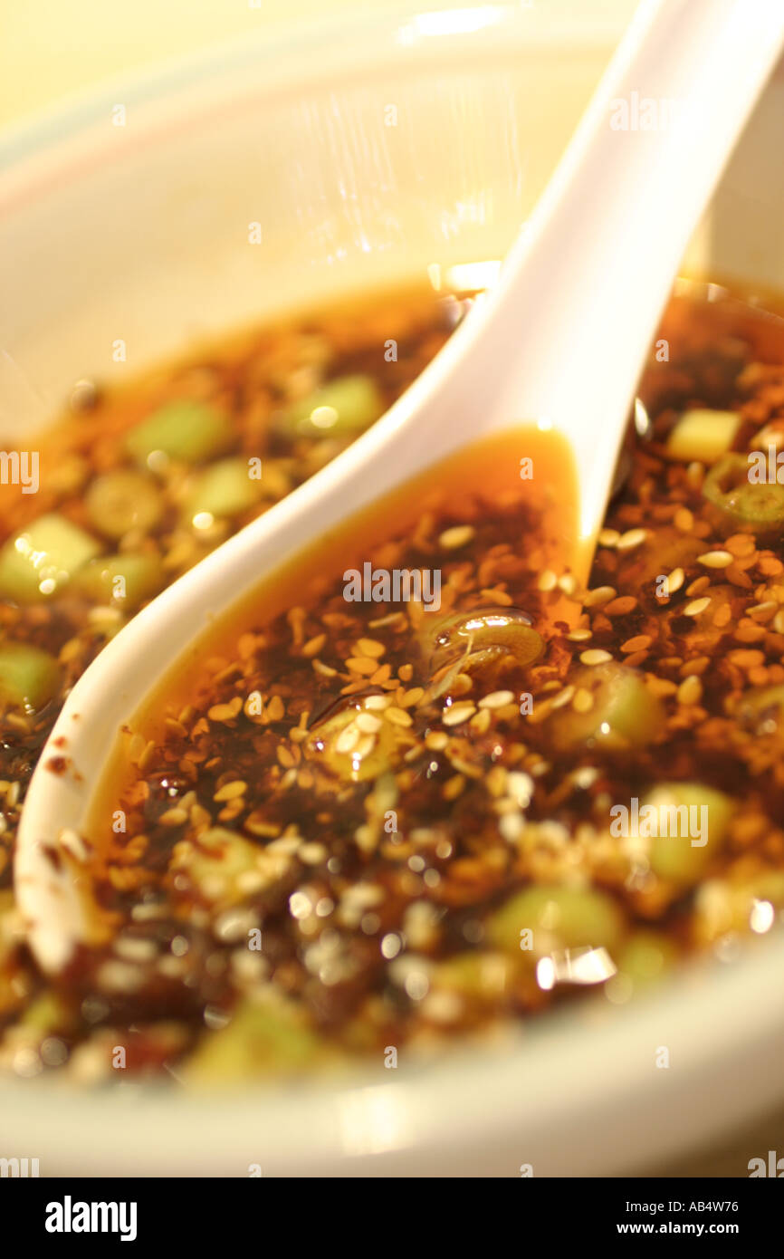 Chinese style chili sauce for wontons Stock Photo - Alamy