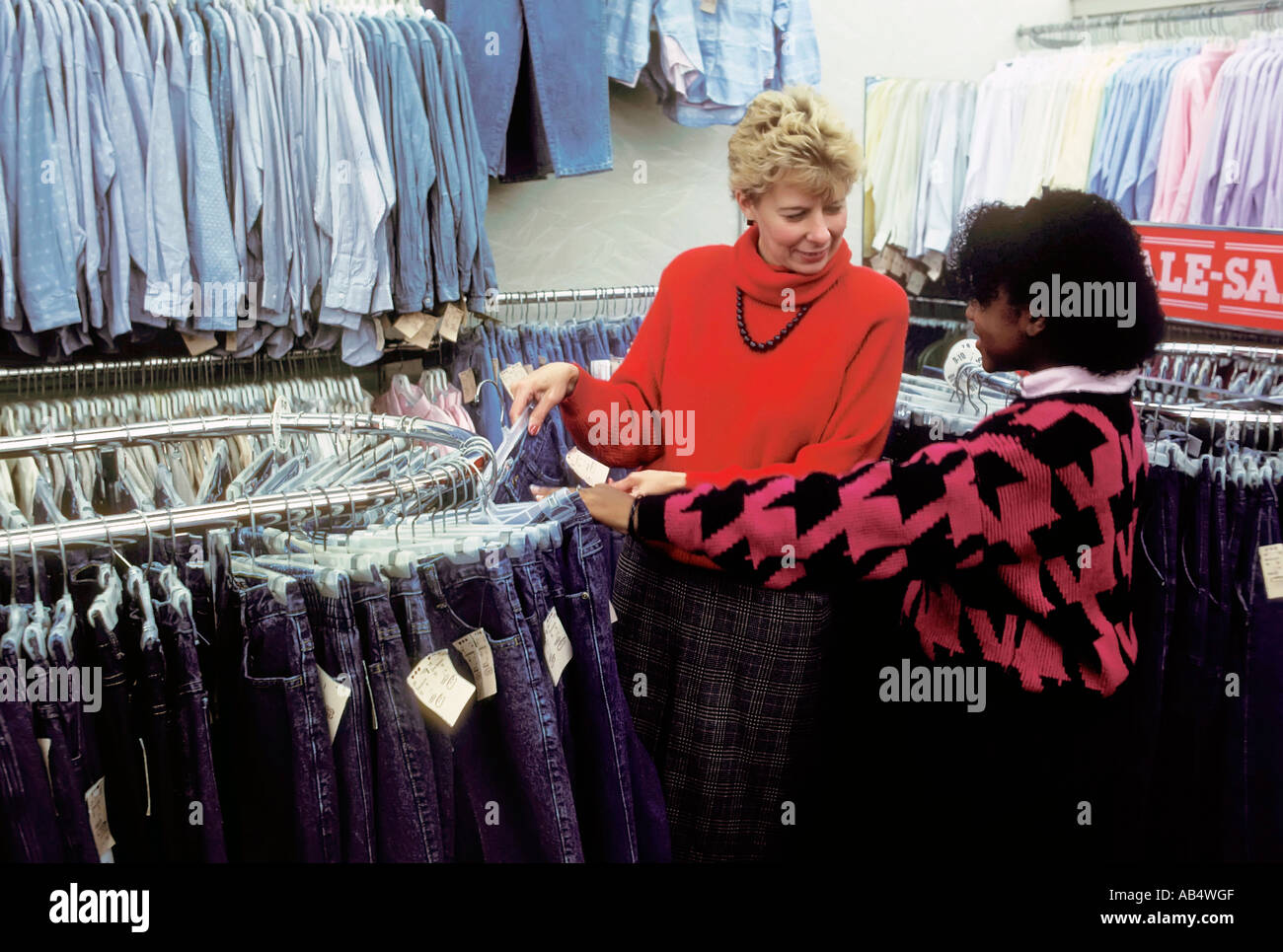 Teen girls shop for clothing in a mall shopping center Stock Photo - Alamy