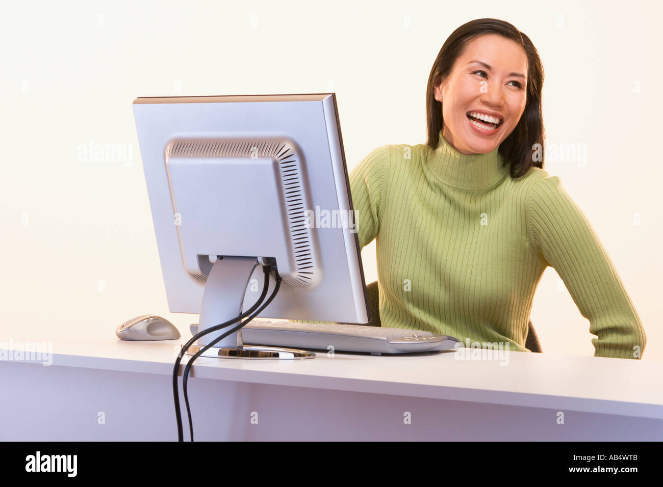 Person sitting in front of computer hi-res stock photography and images ...