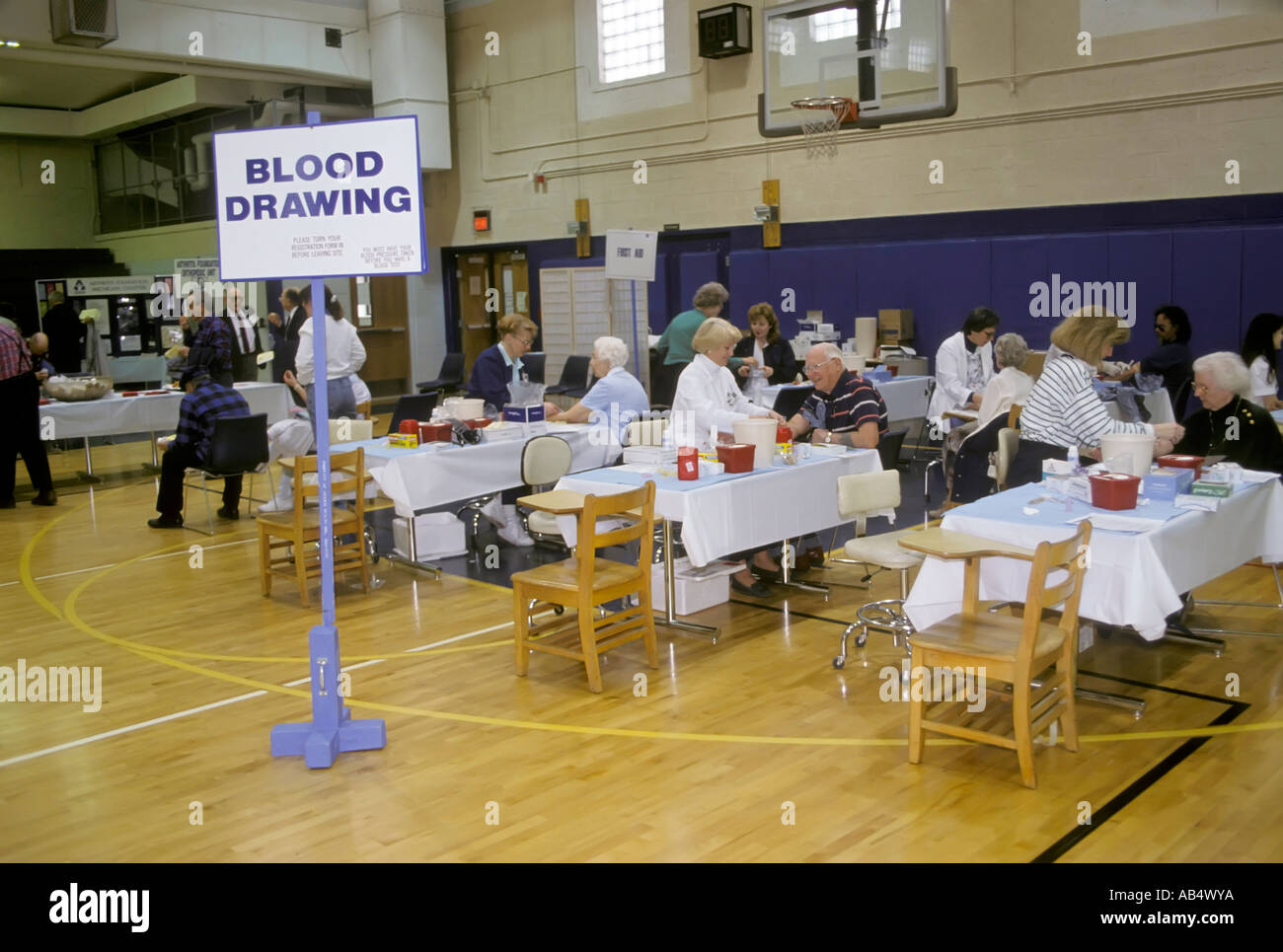 Volunteers donate blood to a red cross blood bank drive Stock Photo - Alamy