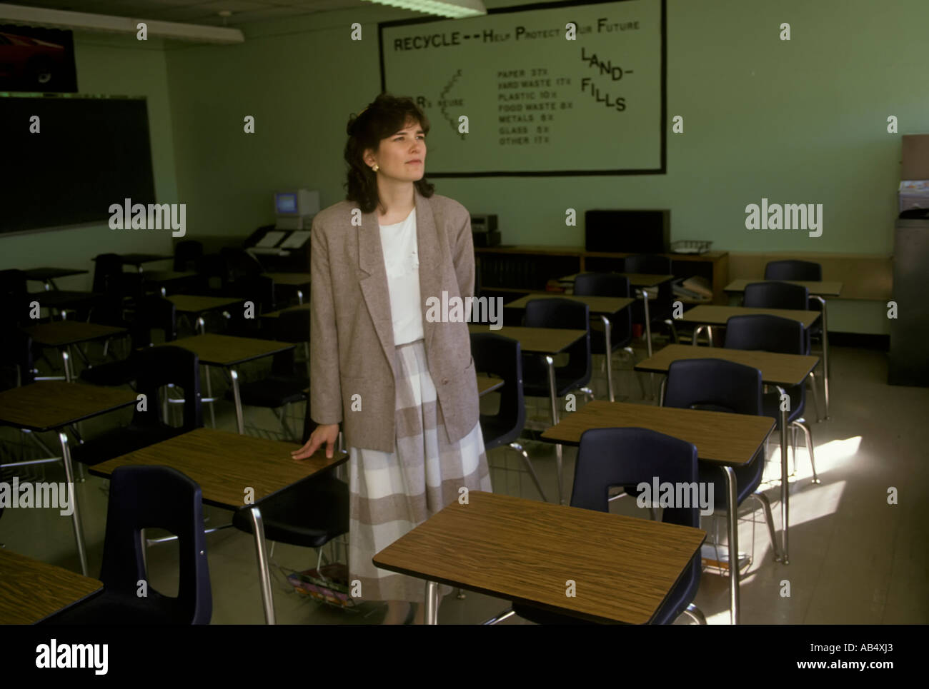 Female teacher alone in empty hi-res stock photography and images - Alamy