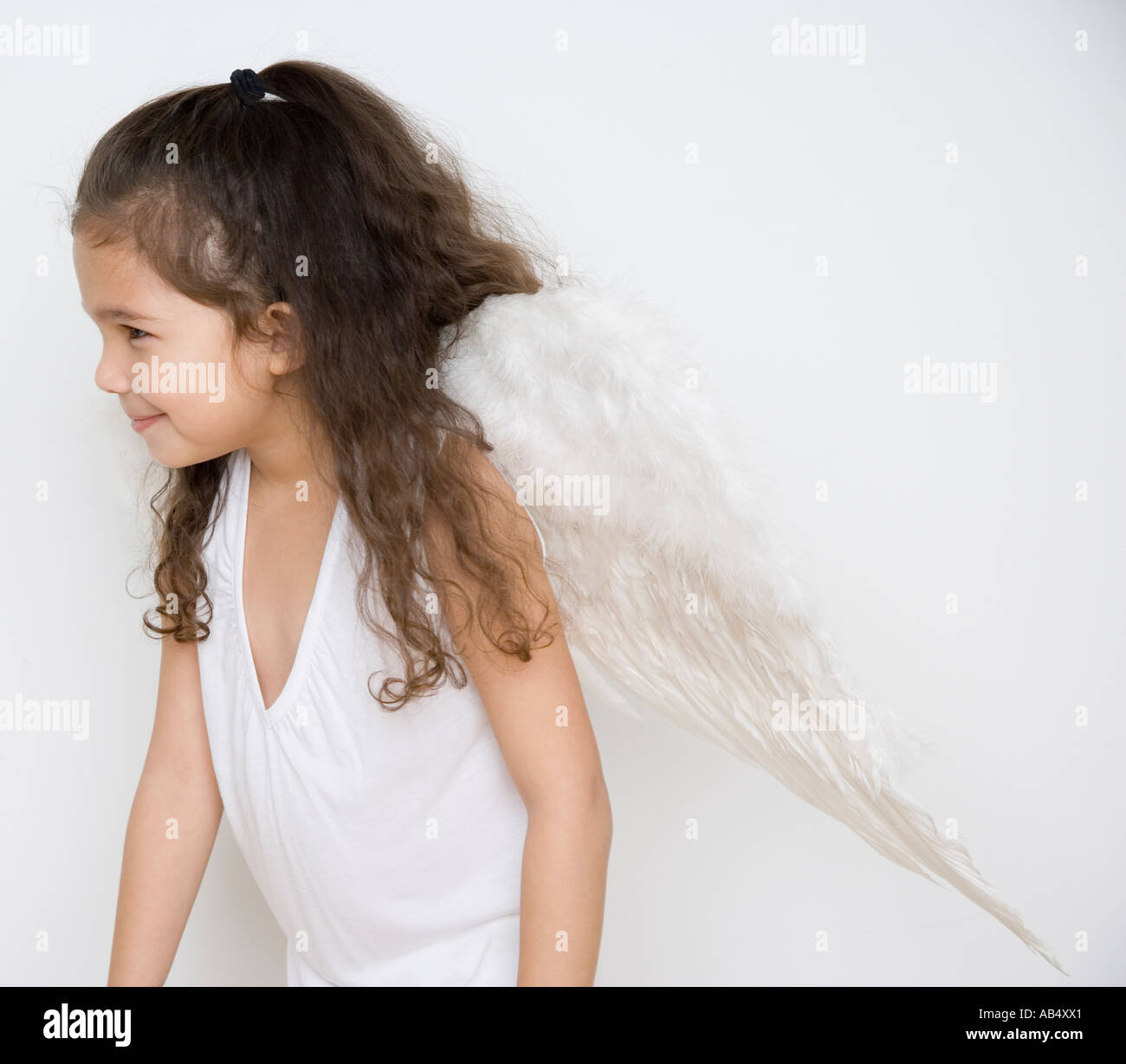 Angel girl smiling Stock Photo - Alamy