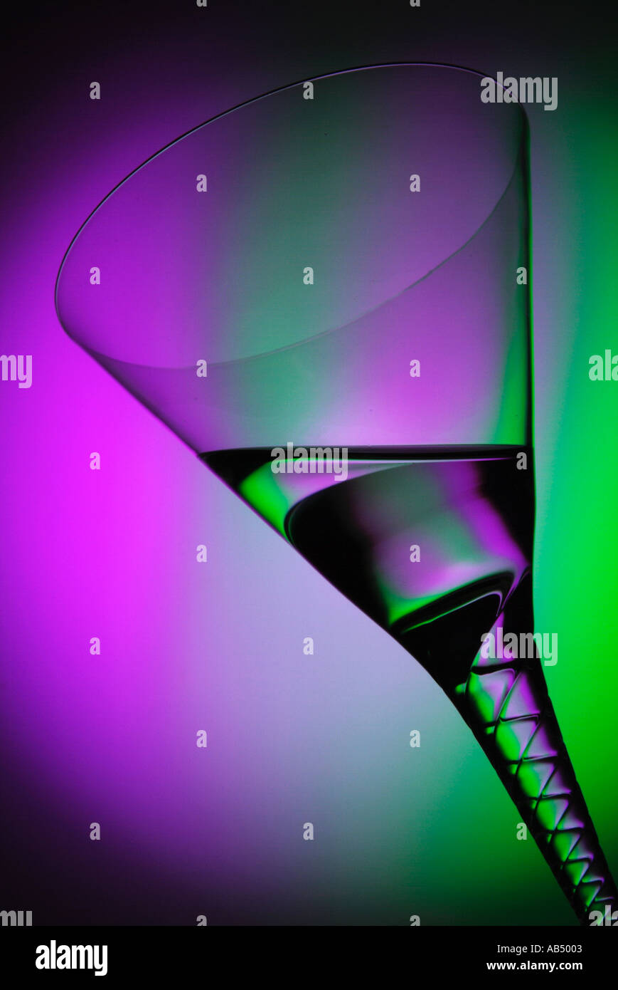 cocktail glass against coloured background Stock Photo - Alamy