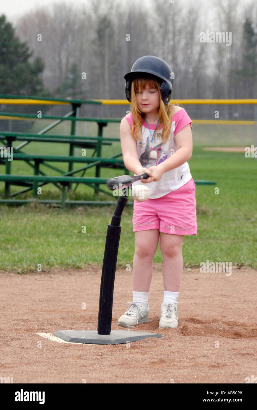5 year old boys and girls learn how to play baseball by participating ...