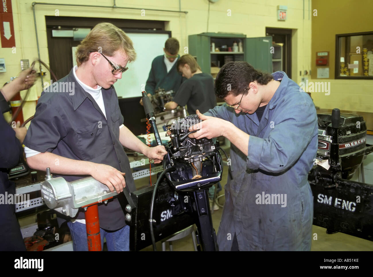 Small engine repair Stock Photo - Alamy