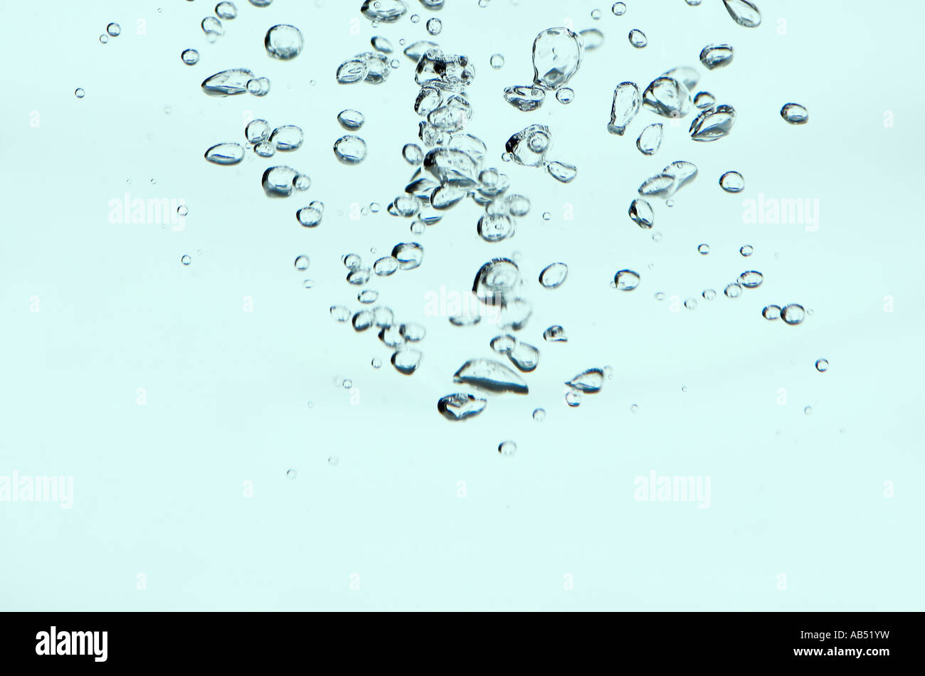 Water bubbles rising through water close up Stock Photo - Alamy