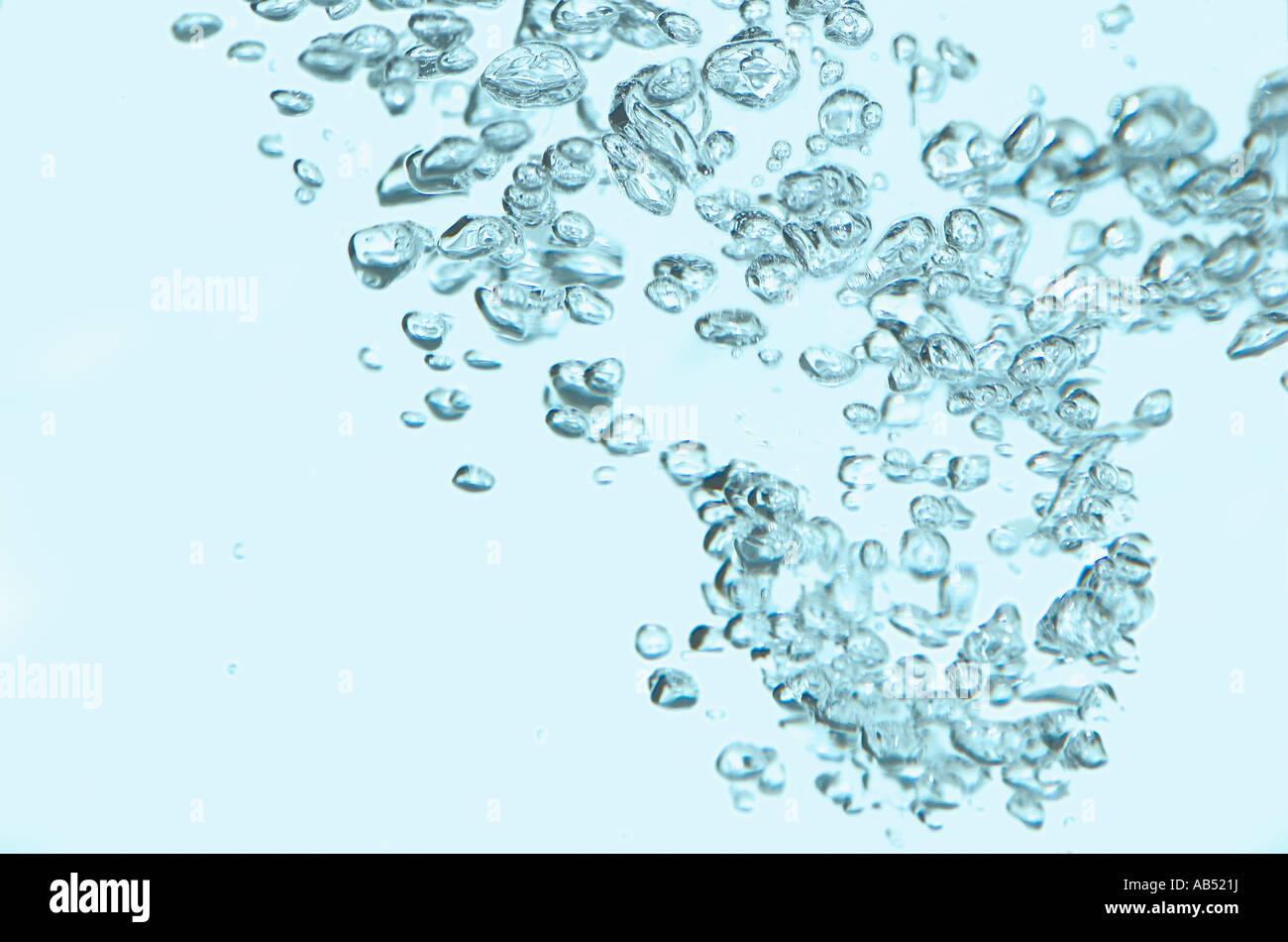 Water bubbles rising through water close up Stock Photo - Alamy