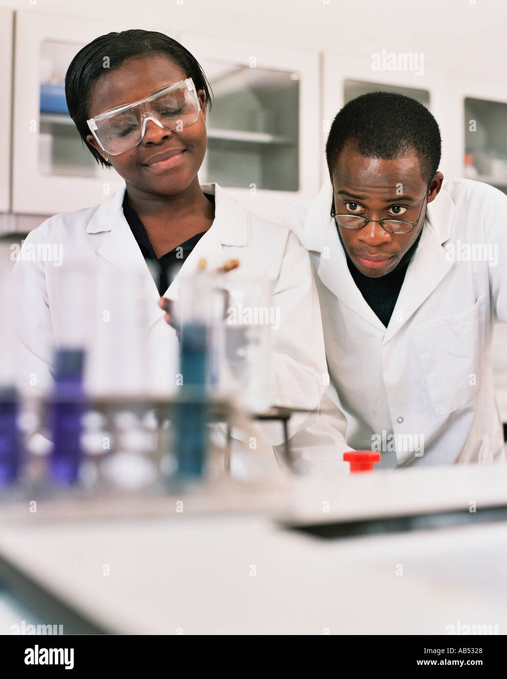 group of expert analists in chemical waiting the result at a chemical ...