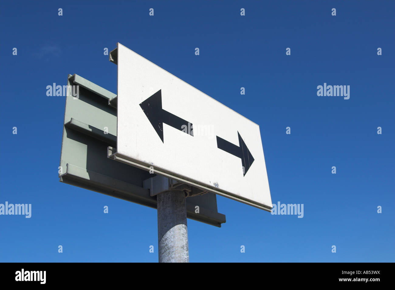Double arrow directional sign Stock Photo - Alamy