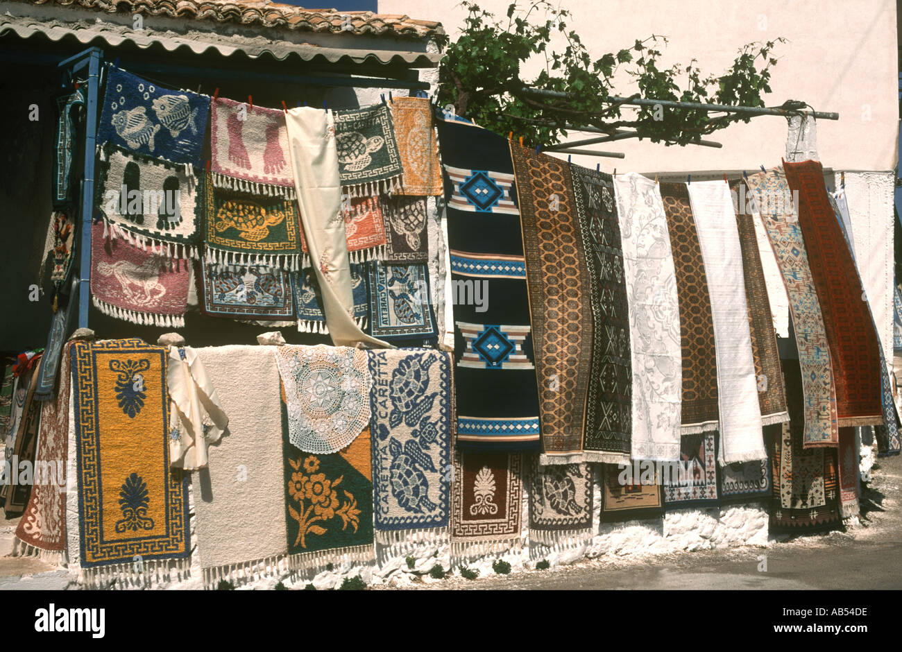 Rugs and lace for sale in the northern village of Volimes on the Greek ...