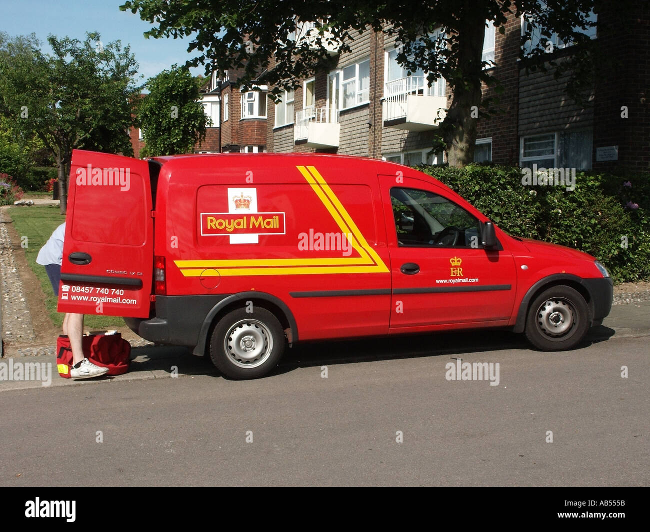 Essex Royal Mail Vauxhall combo 1 7Di van parked postman at rear of van ...