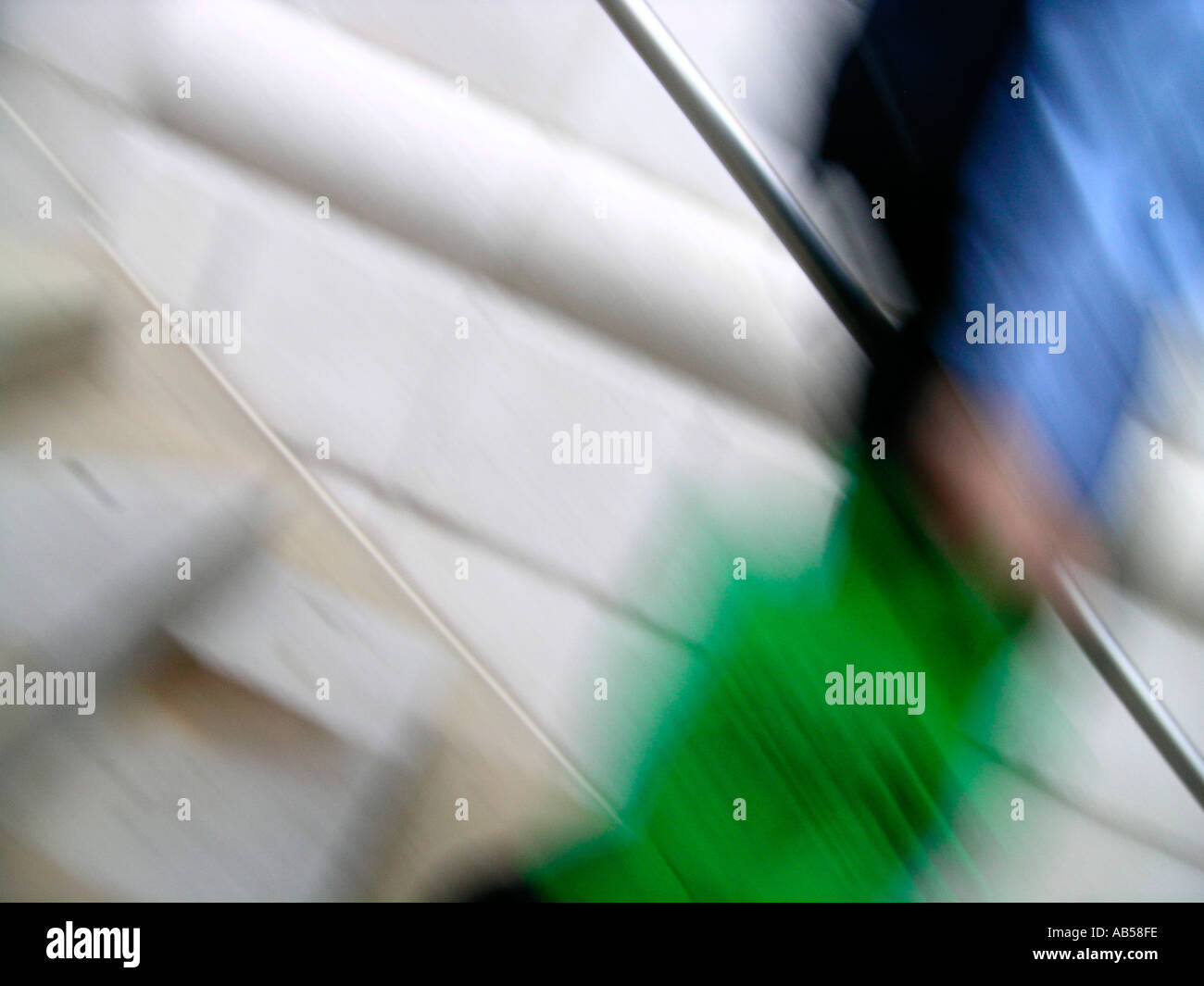 person rushing down stairs Stock Photo - Alamy