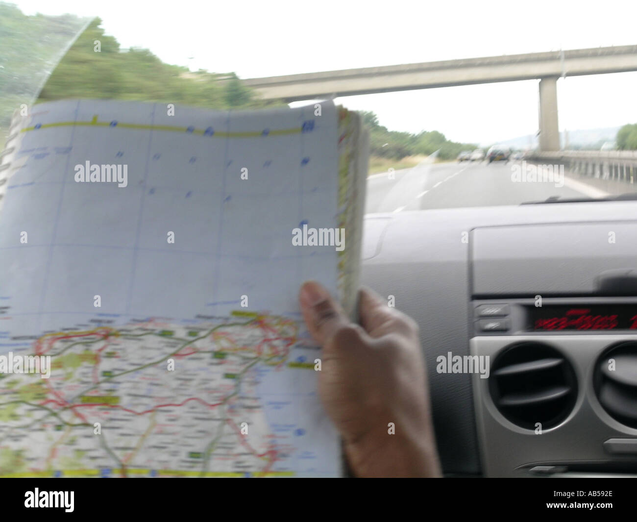 reading road map driving in car Stock Photo - Alamy