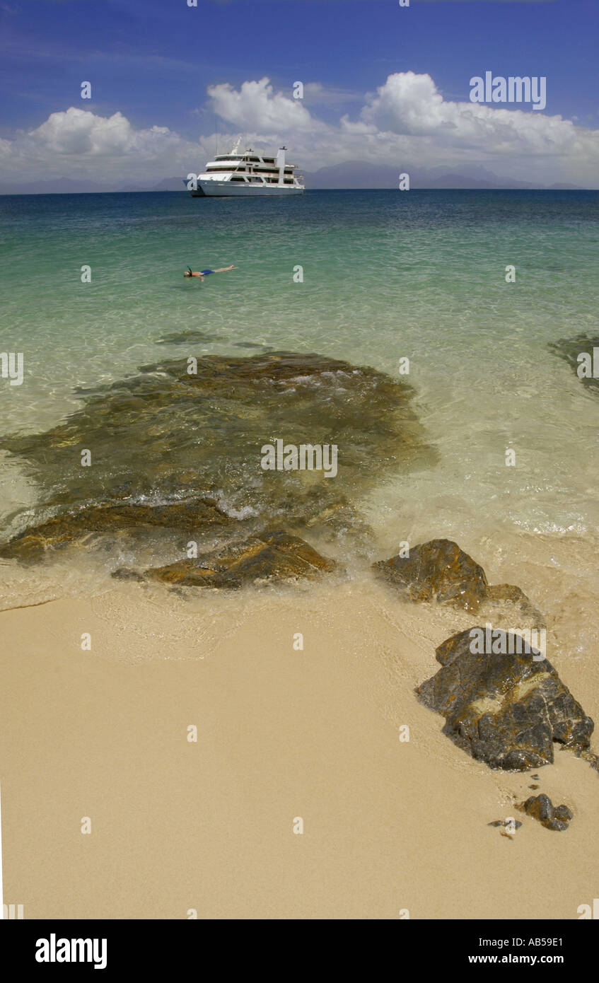 Beach on a tropical Island on Queensland coast Australia Stock Photo ...