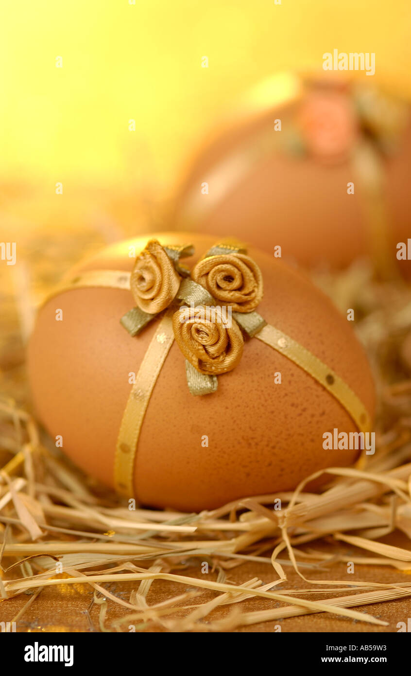 Decorated chicken eggs laying in a nest Stock Photo - Alamy