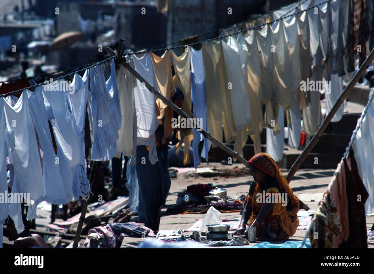 Indian girl washing clothes hi-res stock photography and images - Alamy