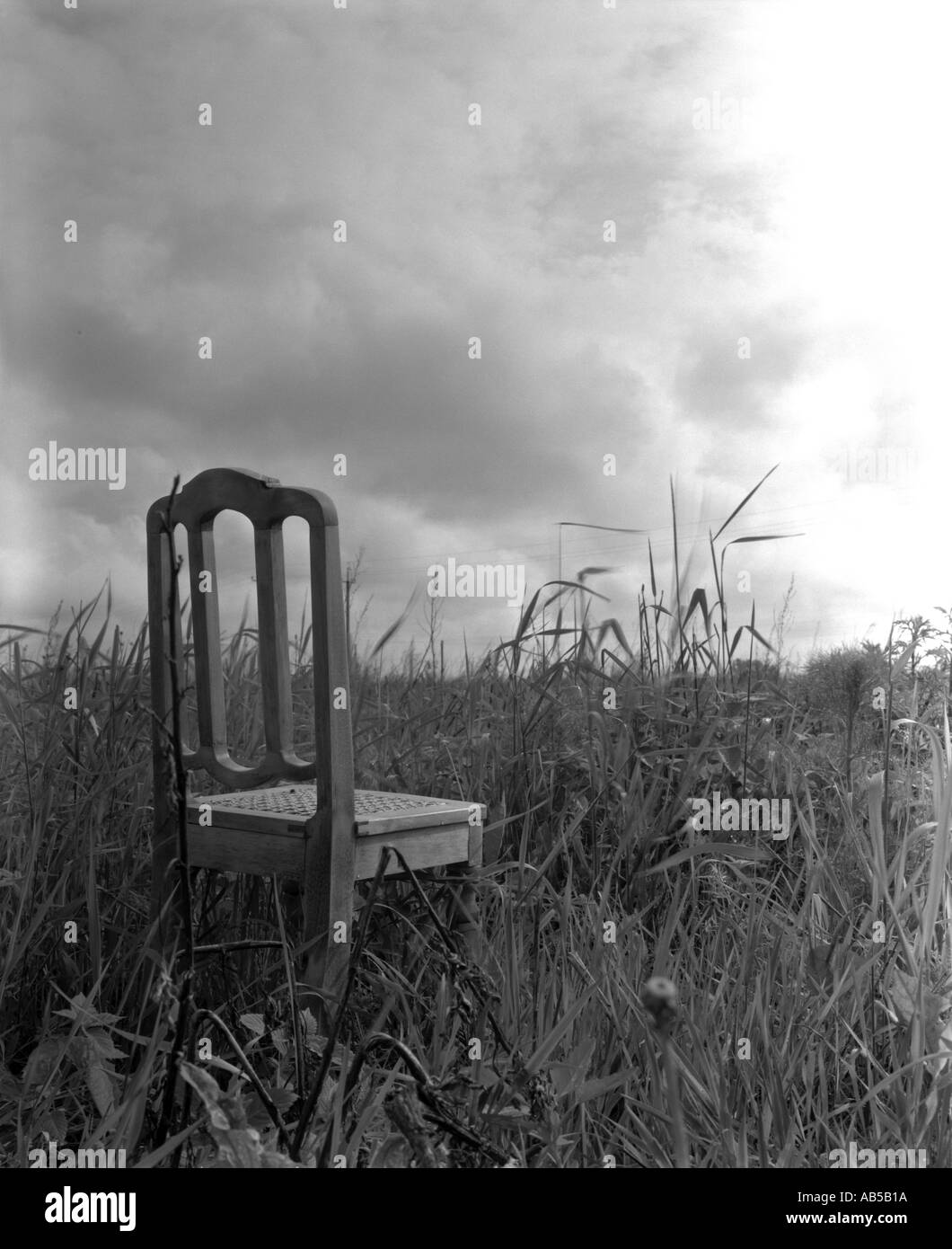 Empty chair in middle field hi-res stock photography and images - Alamy