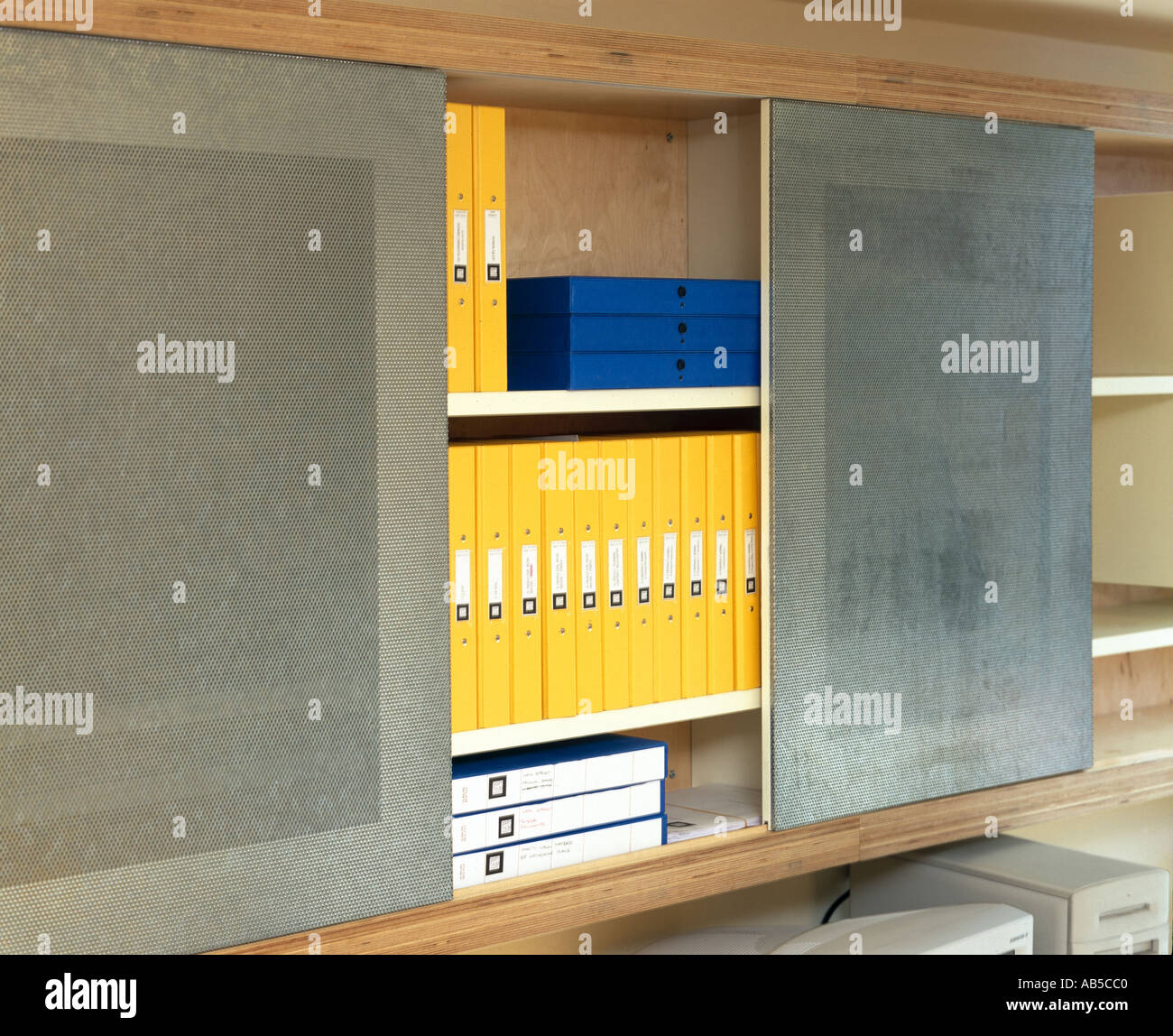 Modern office detail with file storage cupboard Stock Photo - Alamy